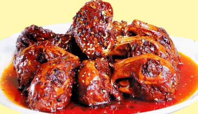 Sichuan Braised Rabbit Head, numb and spicy, with a bright red color ...